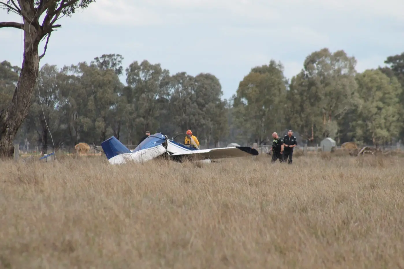 Plane flips prior to landing after clipping powerline